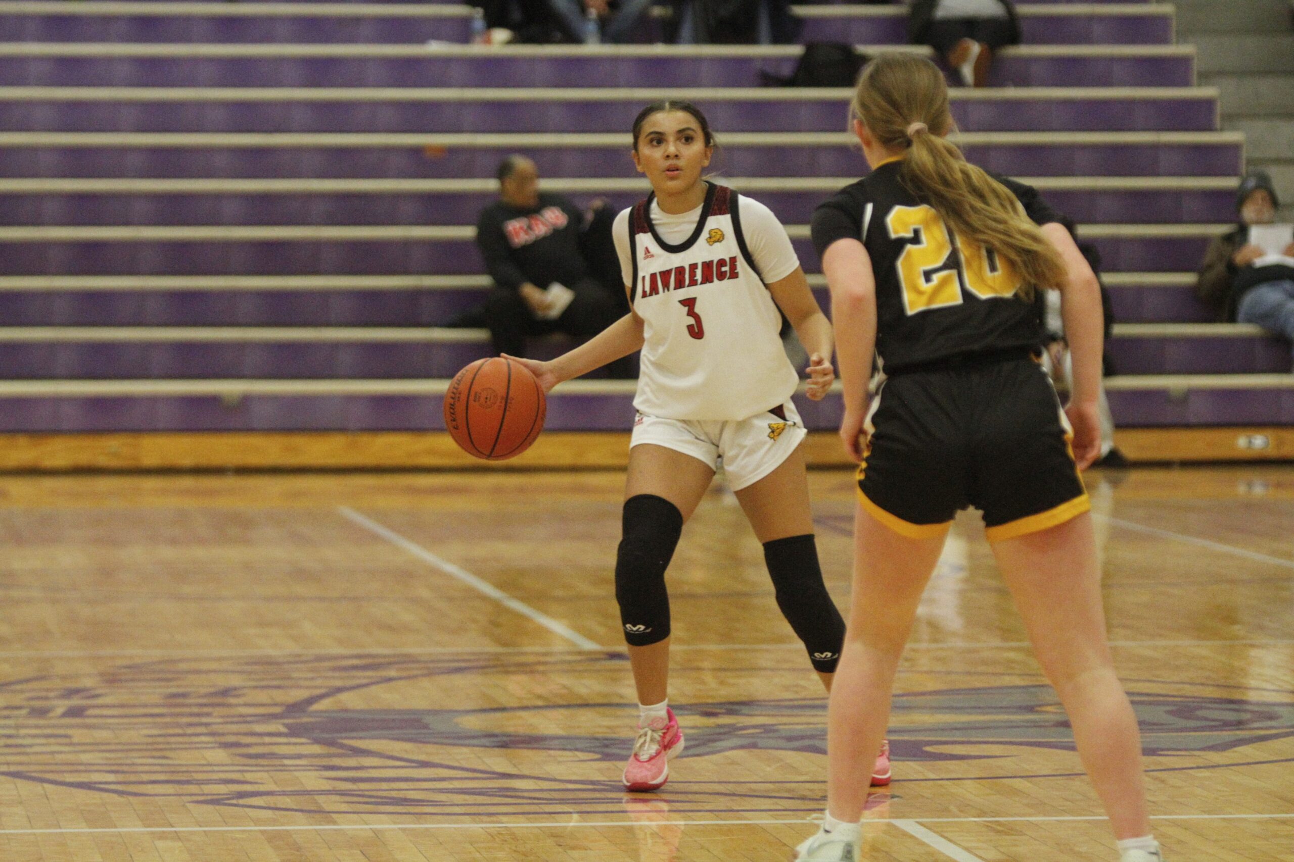 Lawrence girls basketball starts road basketball tournament with big ...